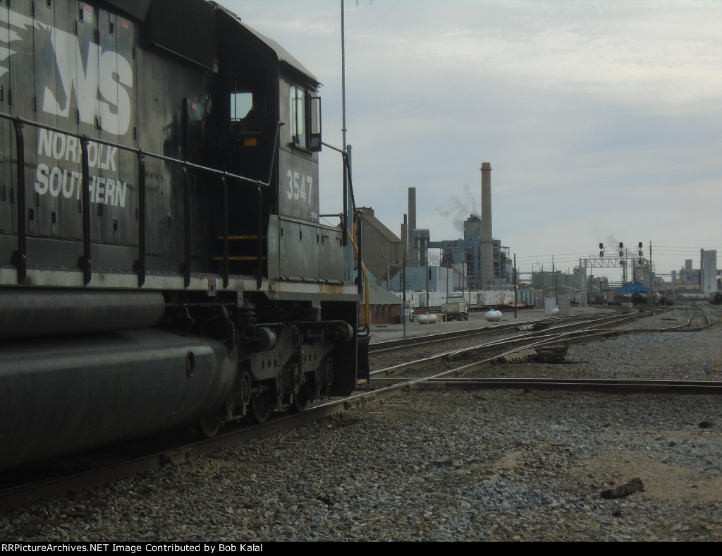 NS 3547 starts to move east back across diamond to yard